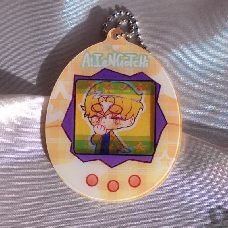 Lenticular Alien Stage Tamagotchi Charm | ALNST Tamagotchi Keychain ...