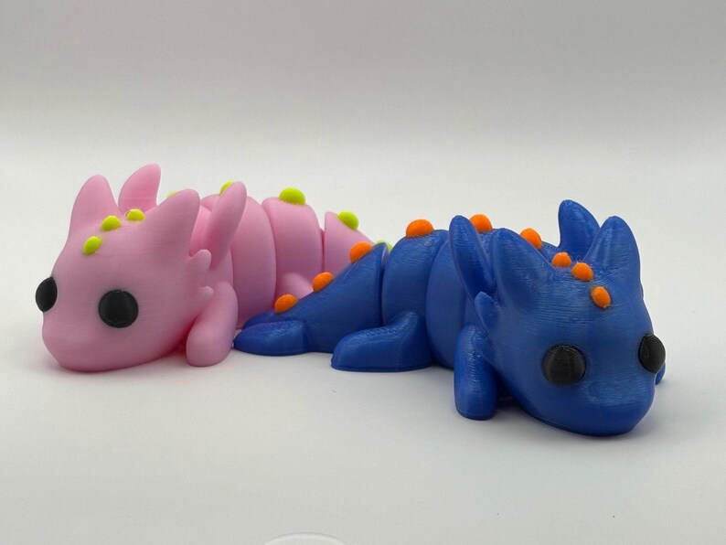 Articulated Baby Dragon – 3D Printed Fidget Toy in Pink or Blue - Etsy
