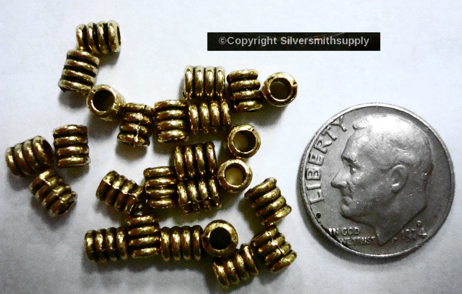 25 Yellow Gold Plated Coil Shaped Spacer Beads 4.5x3.5mm No Lead Zinc ...