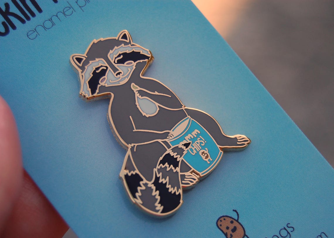 Snackin' Raccoon Hard Enamel Pin // Raccoon Eating Potato | Etsy