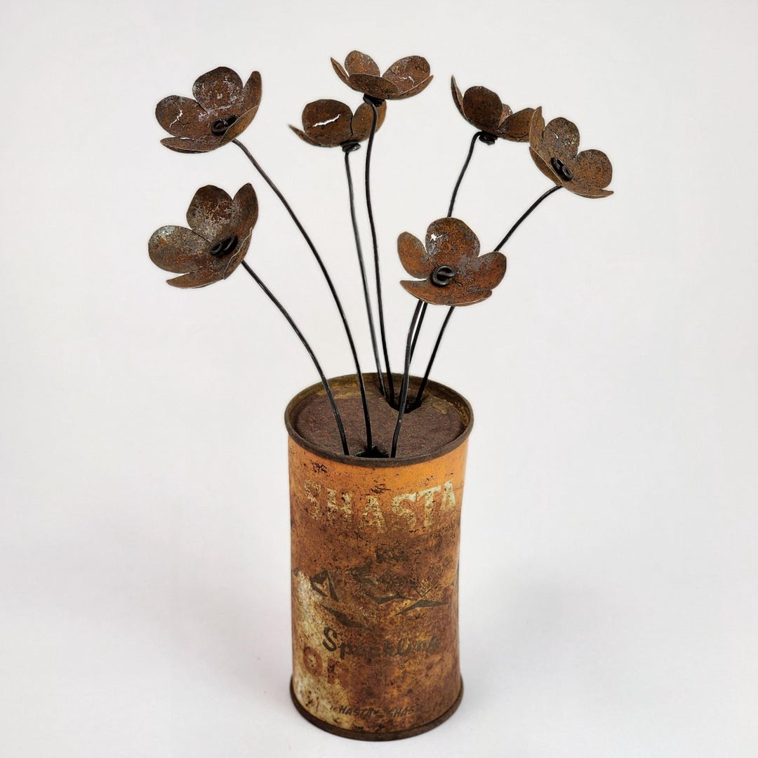 Blooming Rustic Old Shasta Pop Can of Rusty Forever Blooming Flowers ...