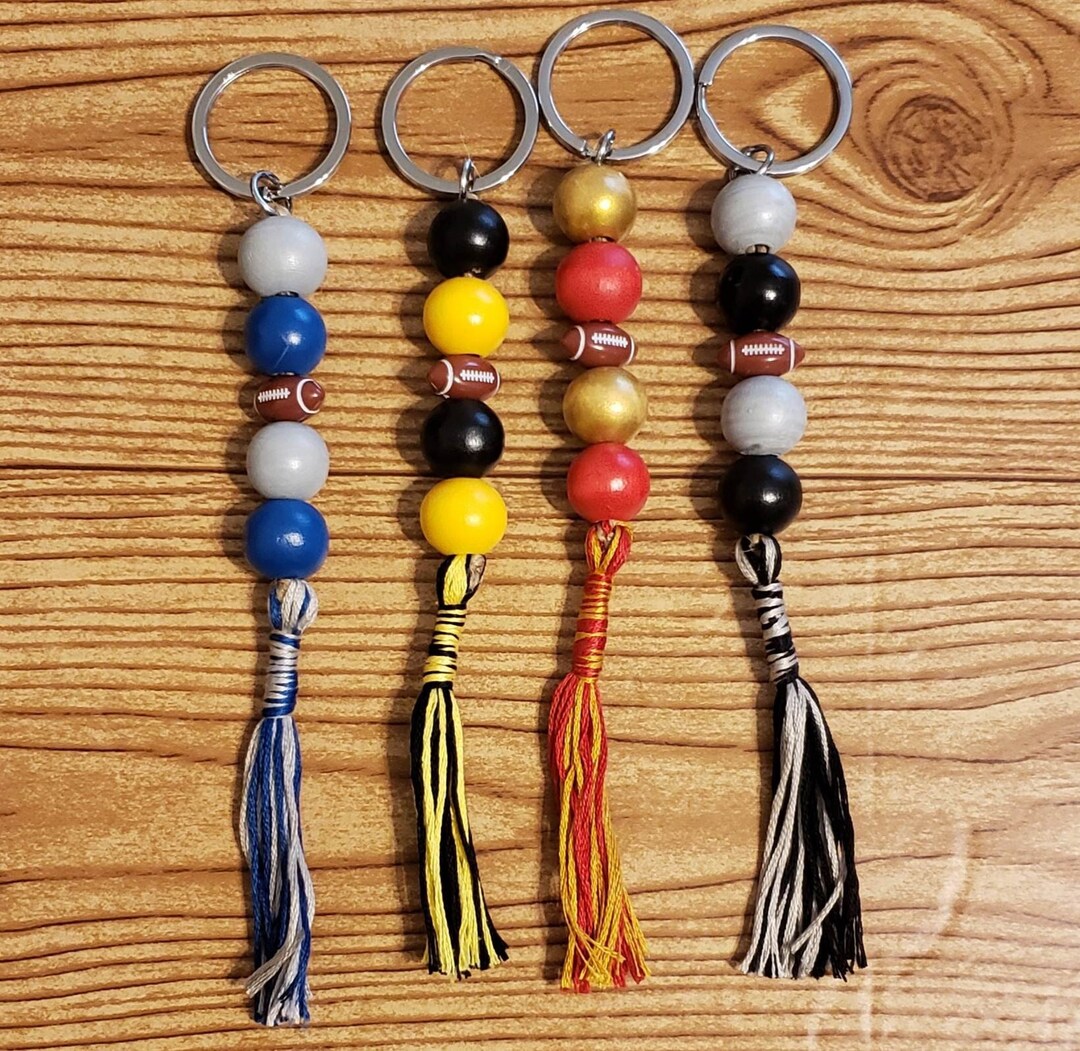 Football Themed Beaded Keychains Sports Raiders 49ers Cowboys Steelers ...