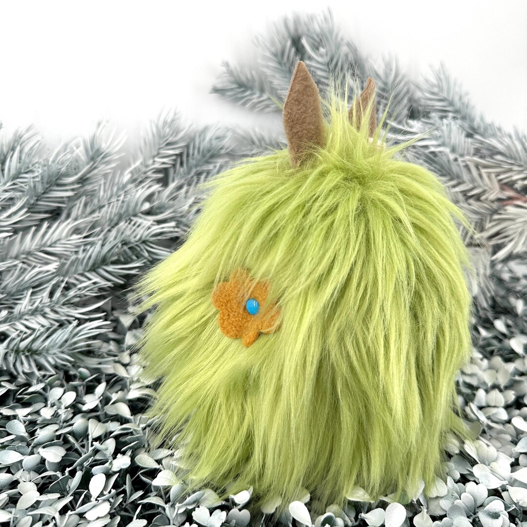 Meadow Monster Super Soft Faux Fur Plushie With Yellow Flowers ...