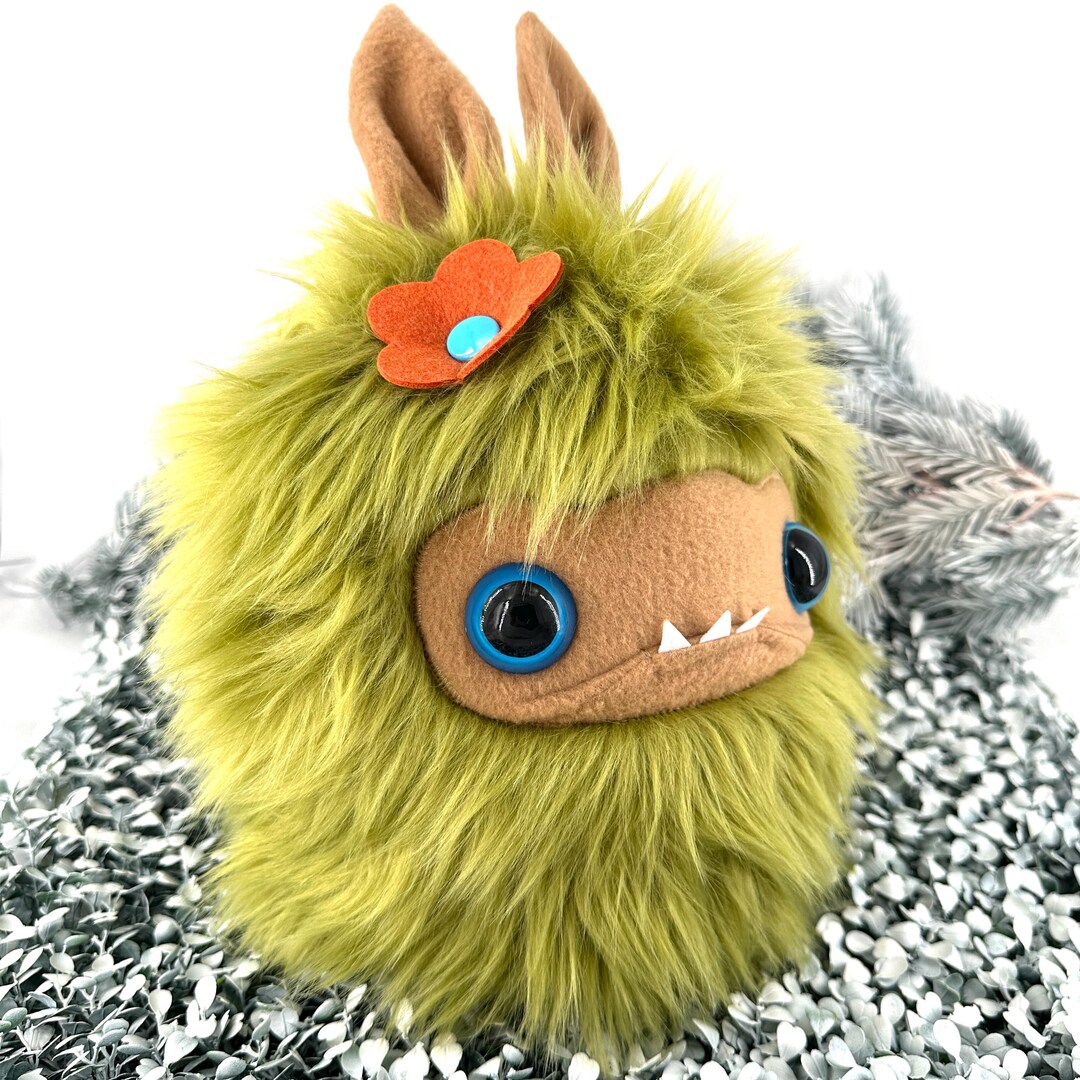 MEGA Meadow Monster Super Soft Faux Fur Plushie With Orange Flowers ...