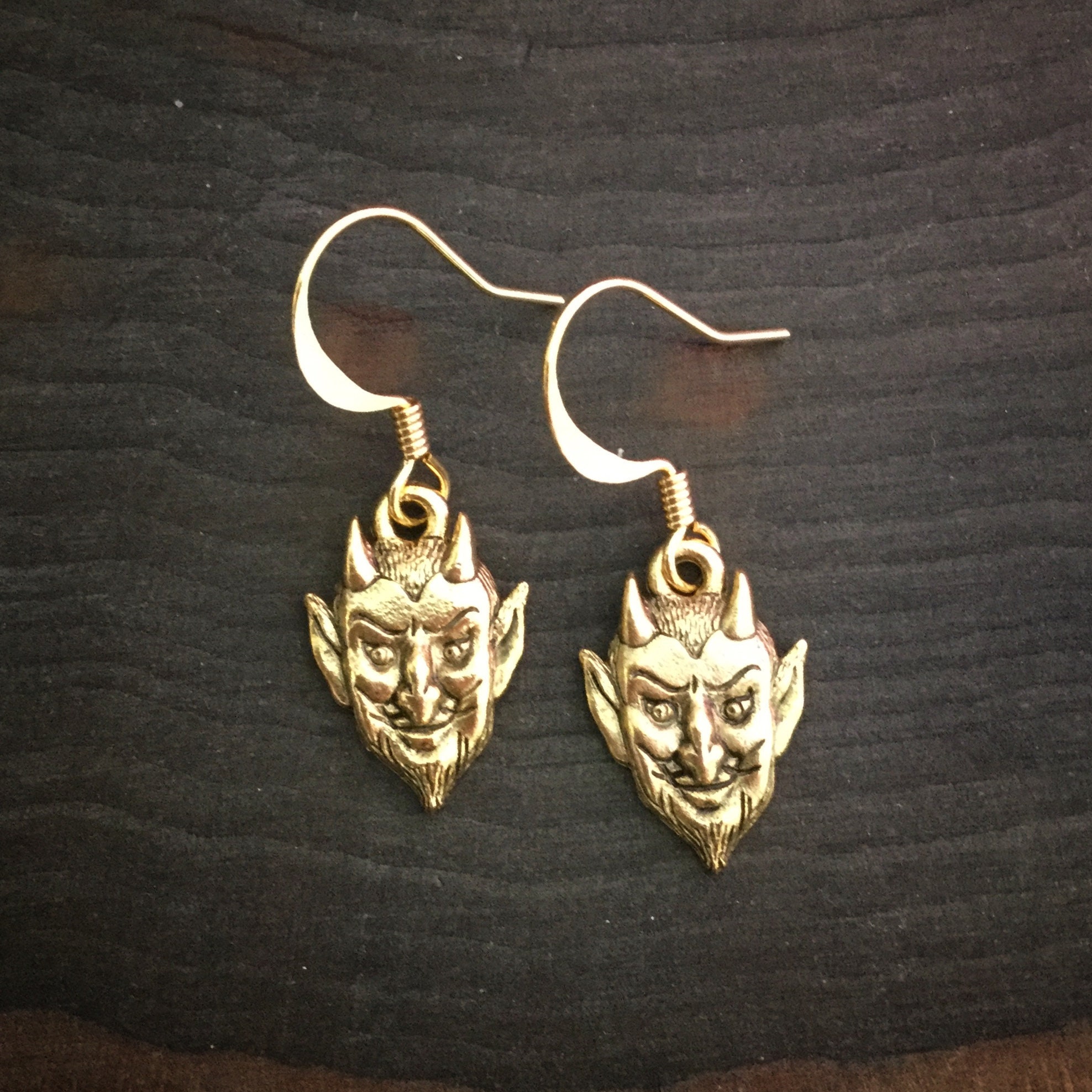 Devil head earrings, Pan, clip on or piercing, available in silver and gold