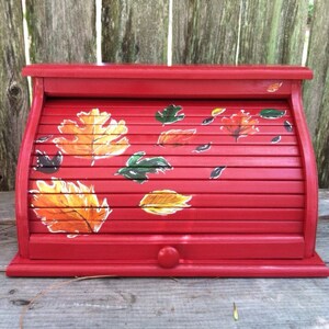 Bread Box Red With Fall Leaves Blowing in Wind Warm Autumn Colors Can ...