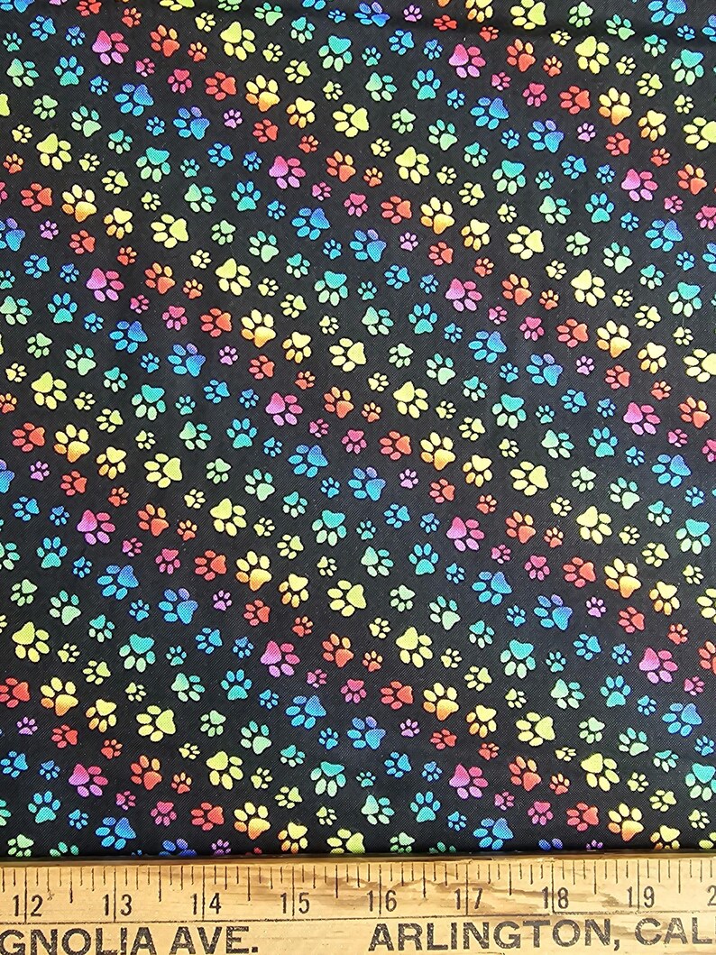 Rainbow Collection Paw Prints by Elizabeth Studio. 100% Cotton Fabric ...