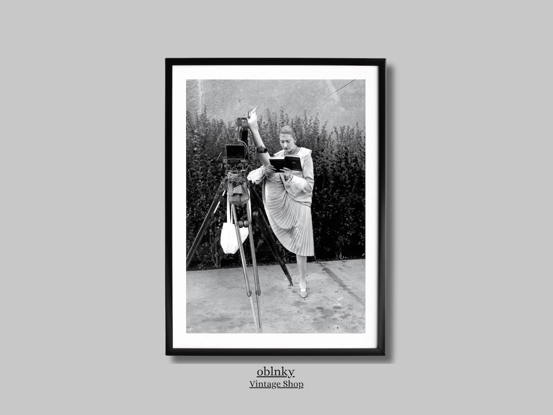 Dancer Reading Print, Actress Kicking Leg up on Camera Reading a Book ...