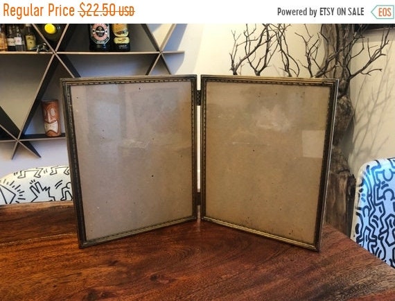 Bi Fold Picture Frame Stands On Floor