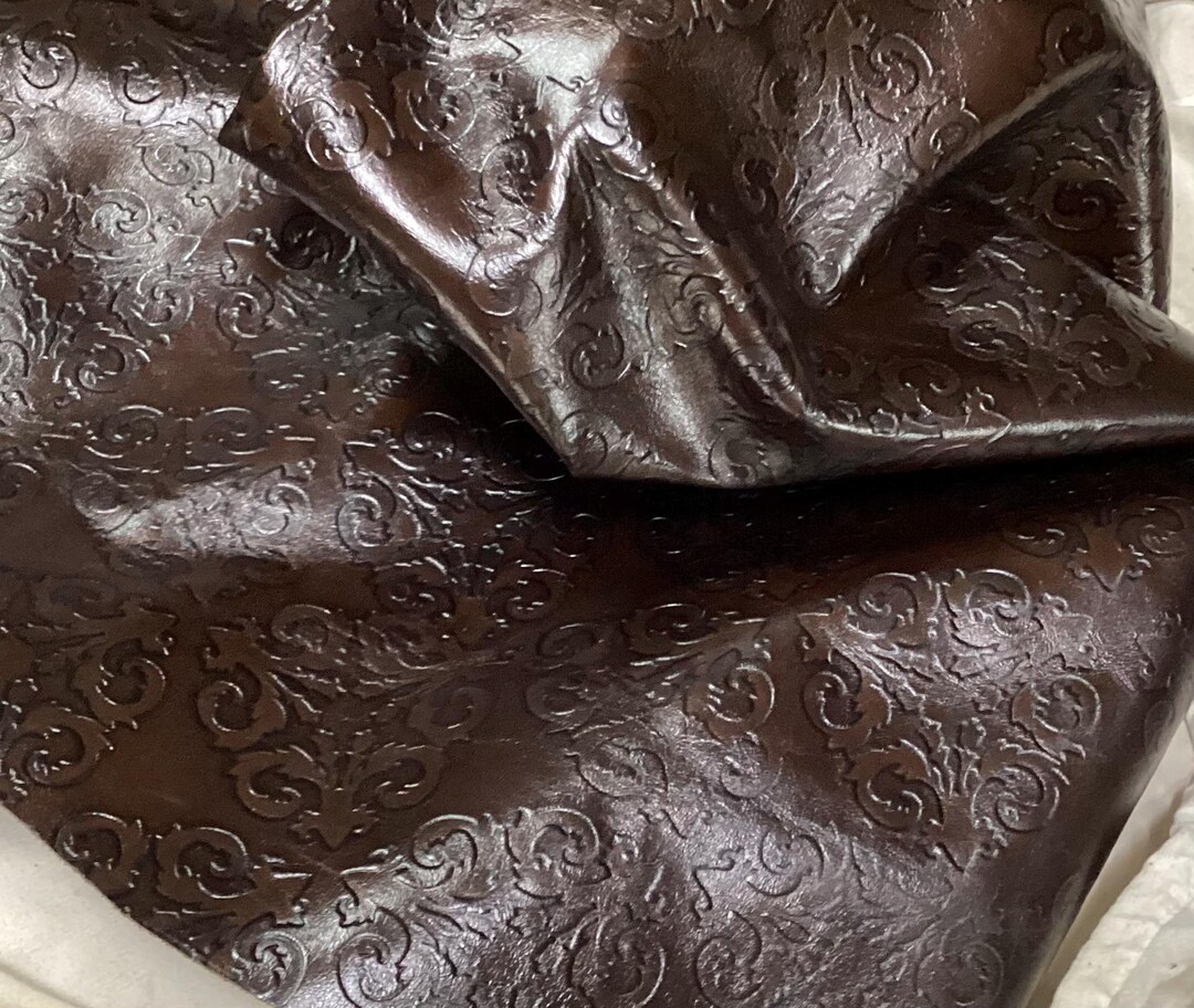 Brown Embossed Leather Cowhides. Fallacious Truffle. Leather Hides ...