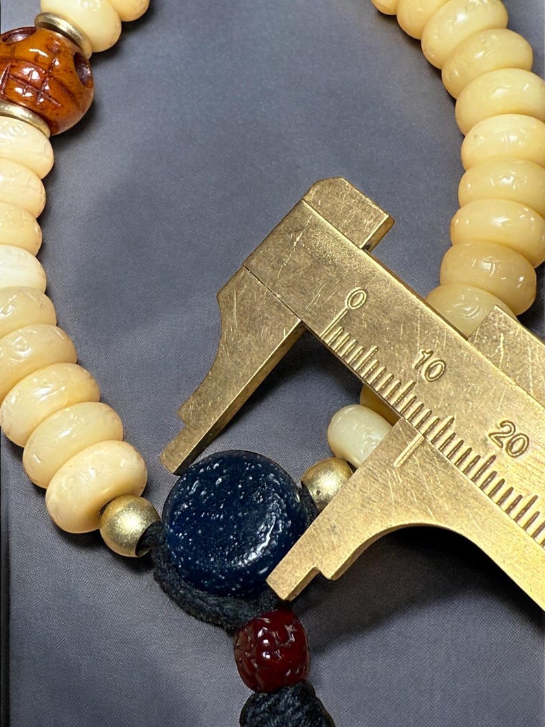 Tibetan Yak Bone Wrist Mala: Om Mani Mantra, Agate & Citipati Skull - Etsy