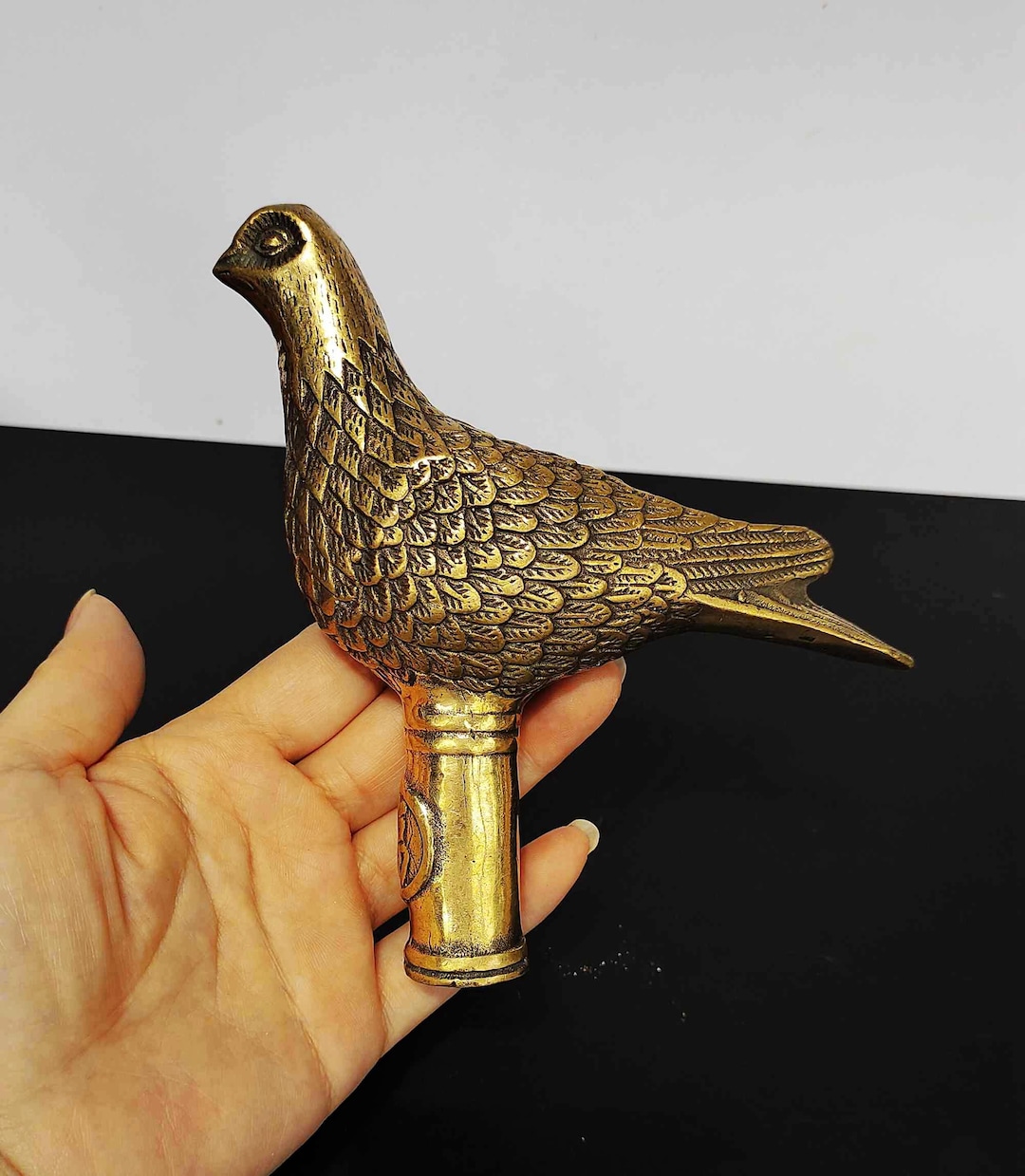 A Handcrafted Brass Bird Cane Head Statue, Designed as a Thoughtful and ...
