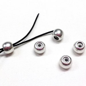 Silver Stopper Beads With Rubber Tube, Slider Stopper Beads, Smart Bead ...
