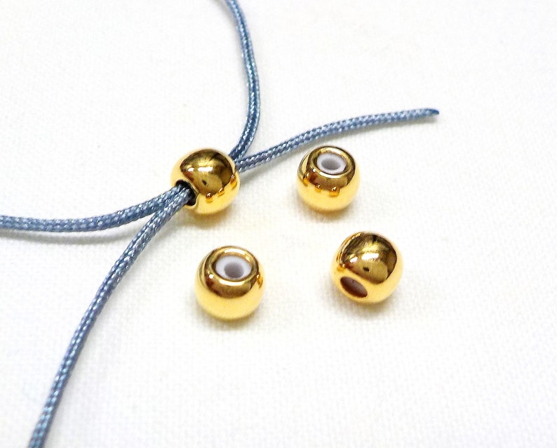 Gold Stopper Beads With Rubber Tube, Slider Stopper Beads, Smart Bead ...