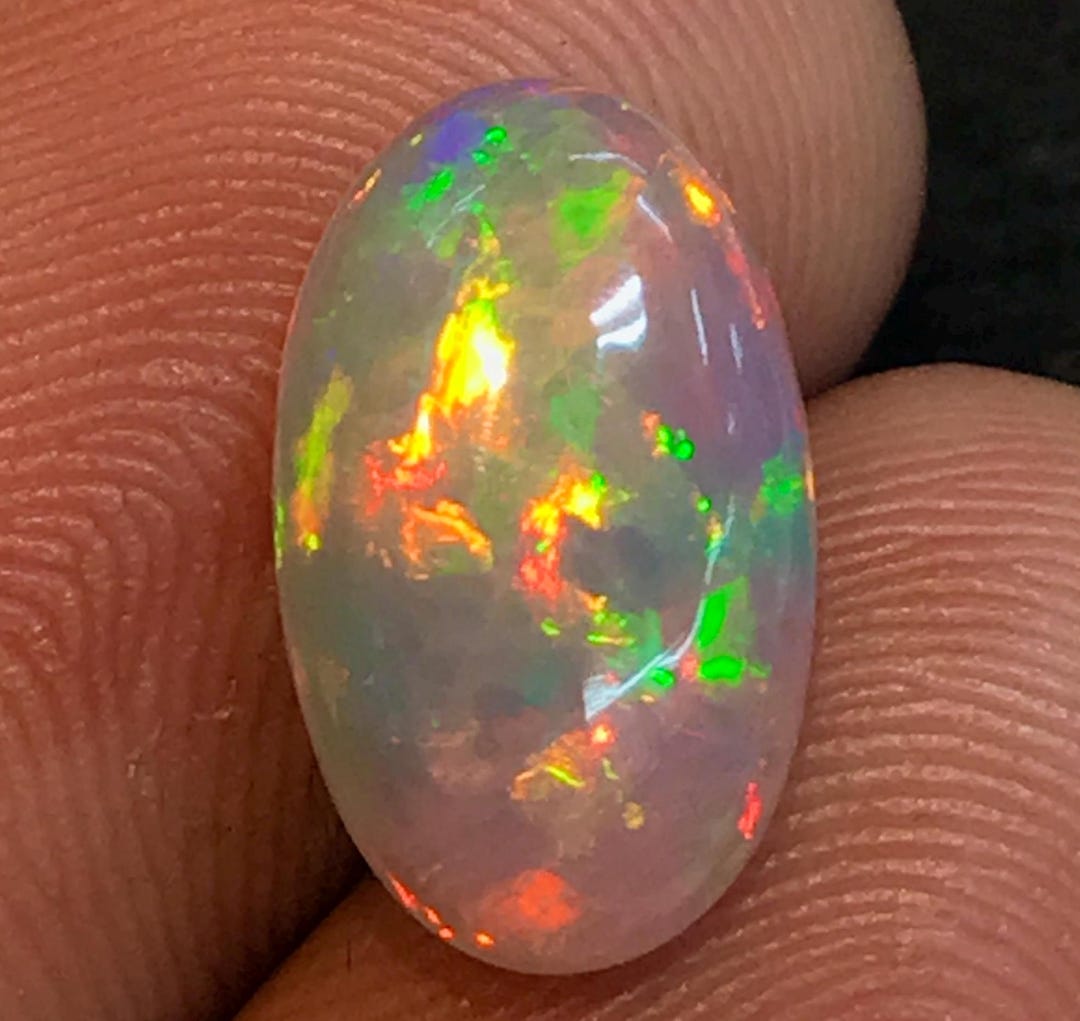 Ethiopian Welo Opal: Galaxy Mix Red Green Blue Fire (8x13 Mm) - Etsy