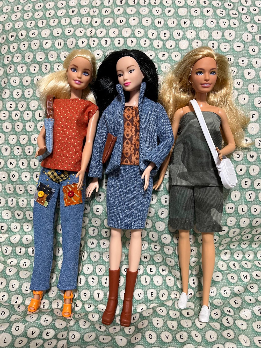 Wardrobe of Tops and Jeans, Upscale Denim Jacket, Top & Skirt, and Camo ...