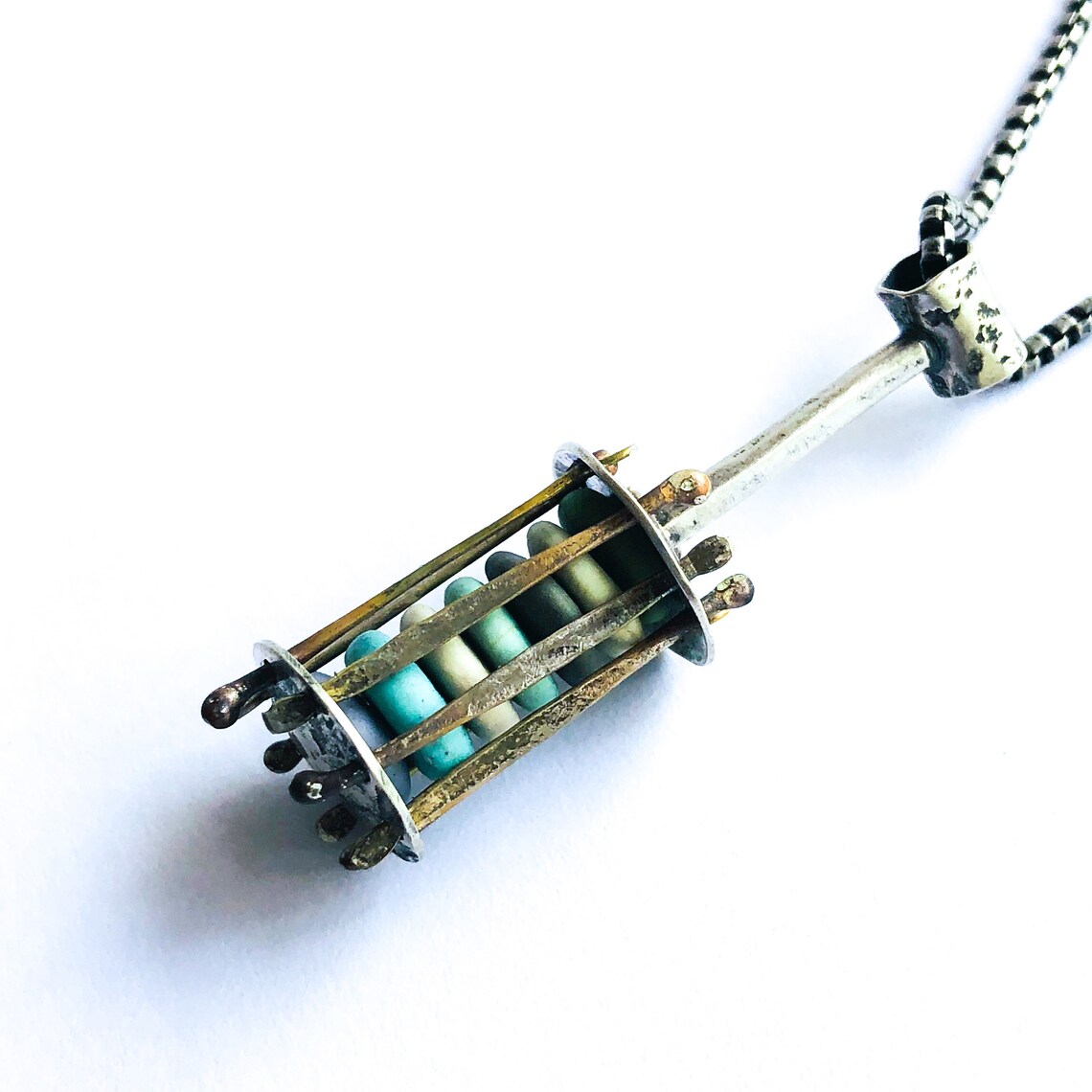 Faux Rocks in a Silver Cage Pendant - Etsy