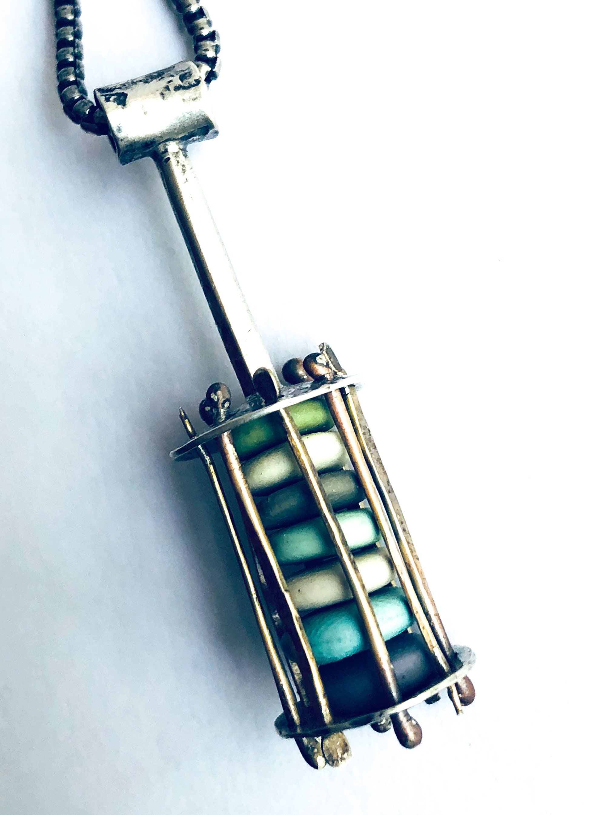 Faux Rocks in a Silver Cage Pendant - Etsy
