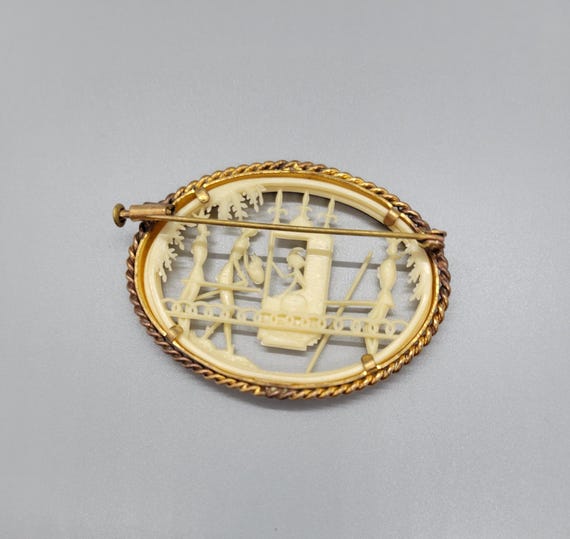 Vintage French Celluloid Brooch of a Woman in a Carri… - Gem