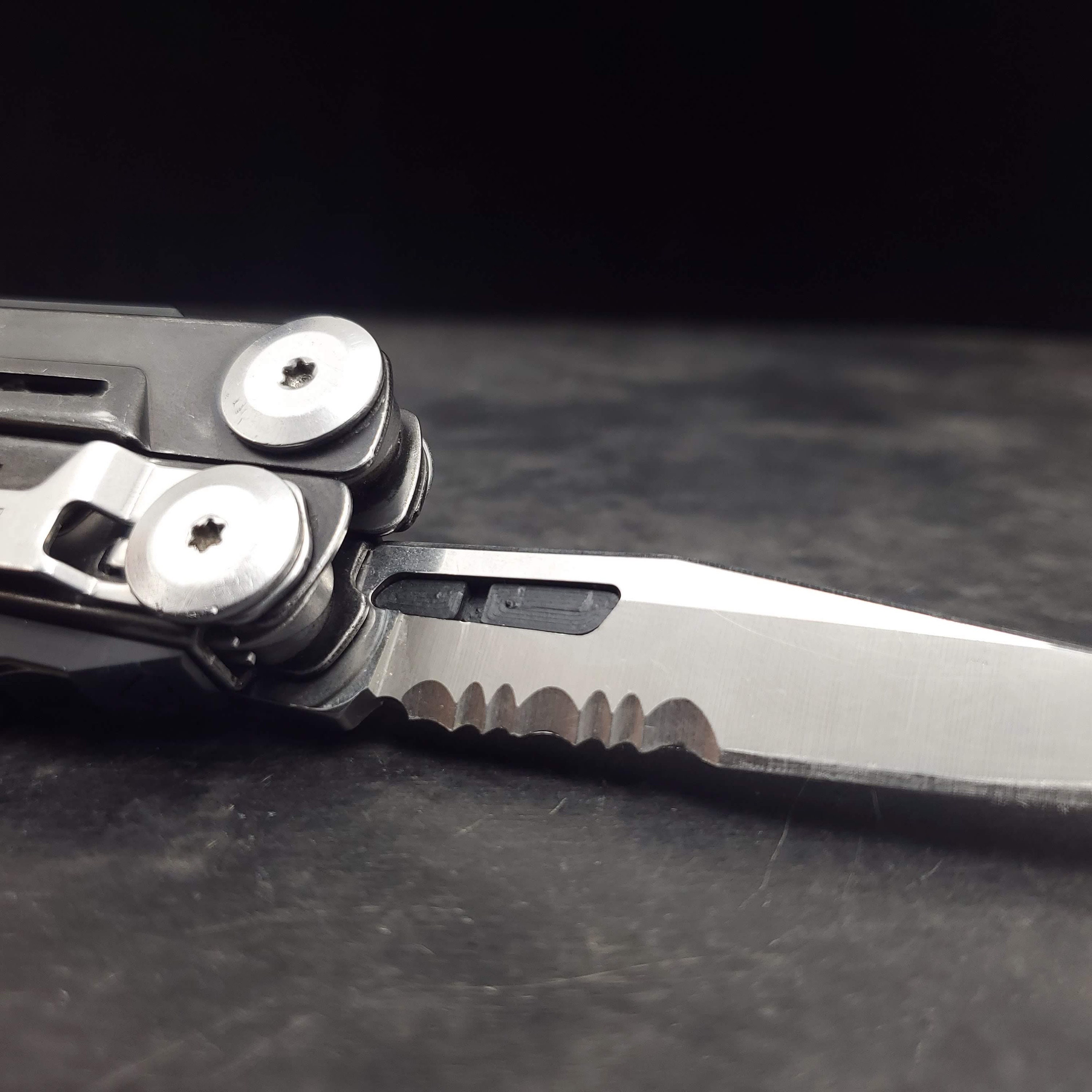 Two Leatherman Signal Thumb Studs — Kristen Van Patten