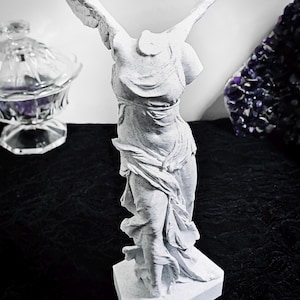 headless angel statue