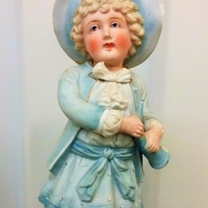 German Colonial Boy Figurine in Blue, Gebruder Heubach Bisque Boy ...