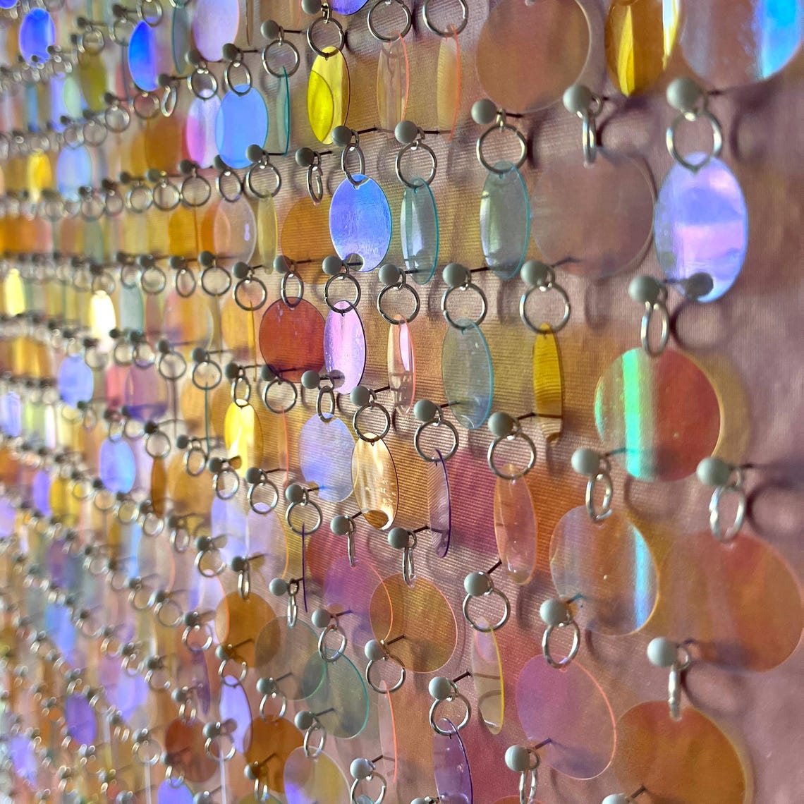 Pinned Wall Installation of Dichroic Transparent Circles on Gradient ...