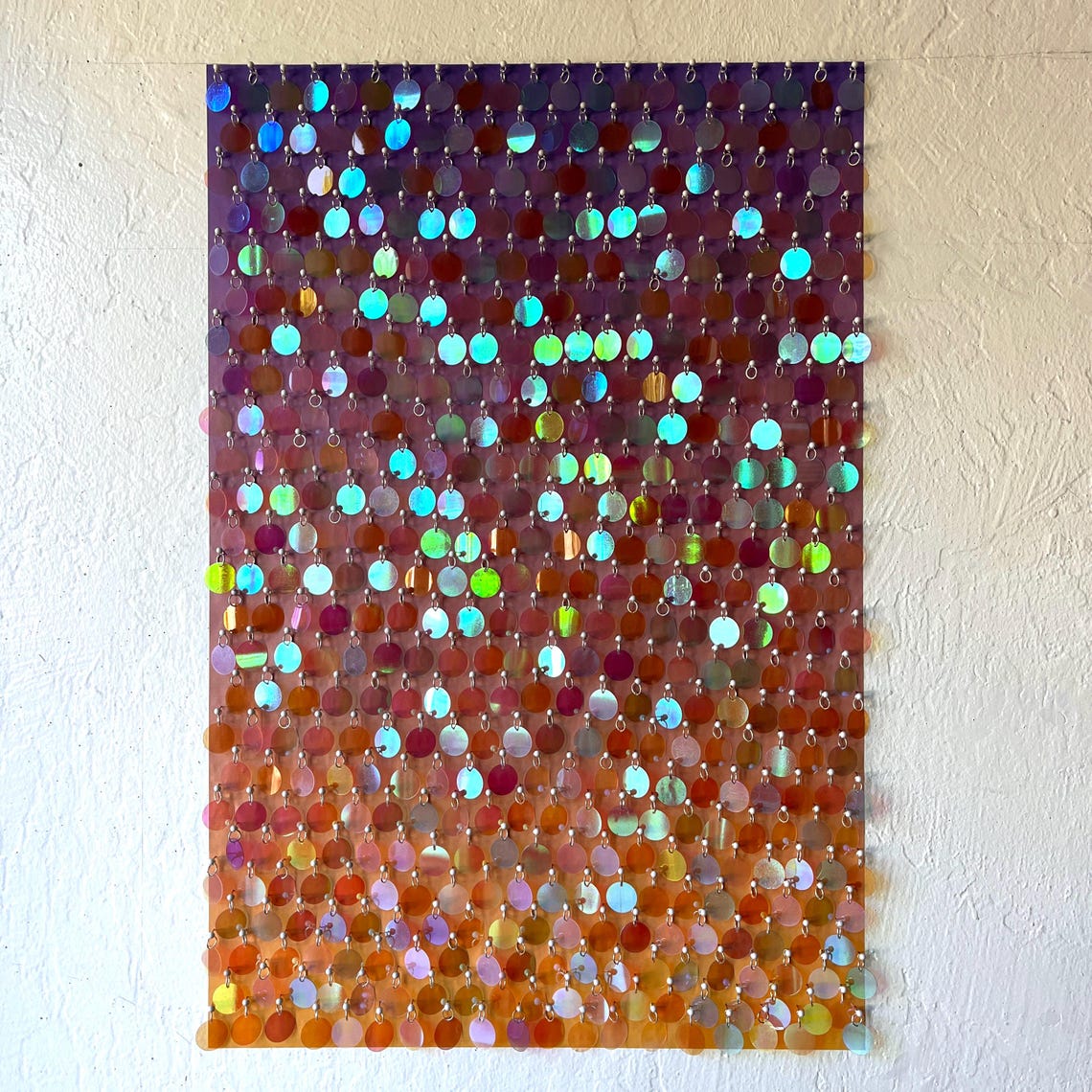 Pinned Wall Installation of Dichroic Transparent Circles on Gradient ...