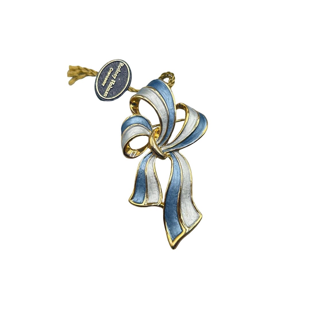Broche noeud papillon Rodney Holman, émail bleu rayé, doré, neuf avec ...