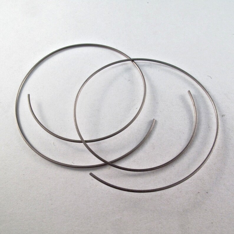 TITANIUM hoop EARRING. large titanium wire earring. spiral | Etsy