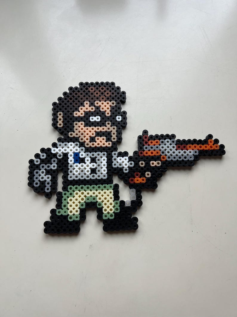 Arte de píxeles con sprites retro de cuentas Perler AVGN de un nerd de ...