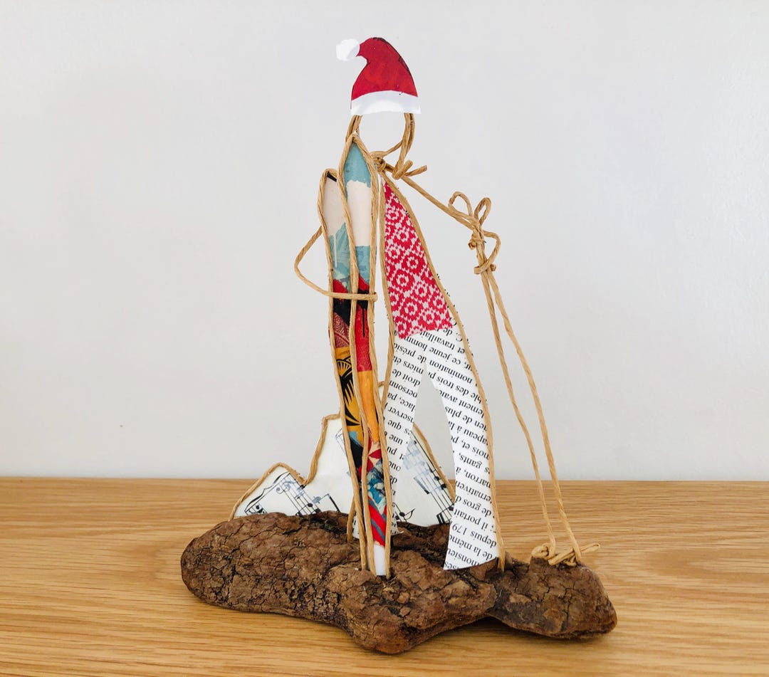 The Skier Figurine, Made of Reinforced Kraft Paper and Wire on a Wooden ...