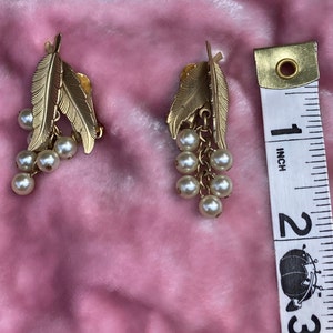 Pearly Drip 70s Disco Feather Clip Earrings - Etsy