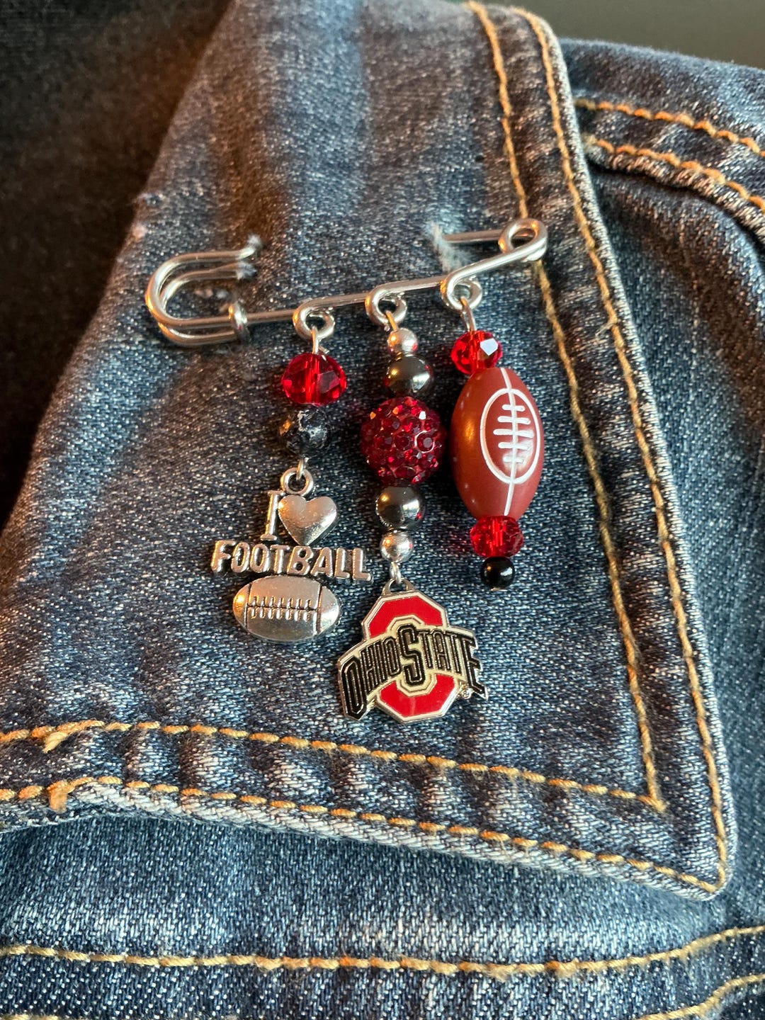 Ohio State Buckeyes Silver Safety Pin. There is an Ohio State Charm ...