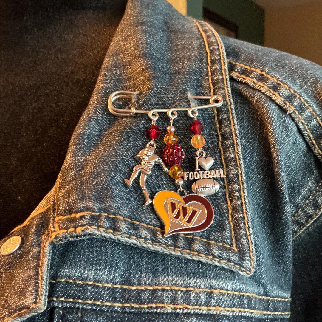 Washington Commanders Silver Safety Pin. There is a Commanders Heart ...