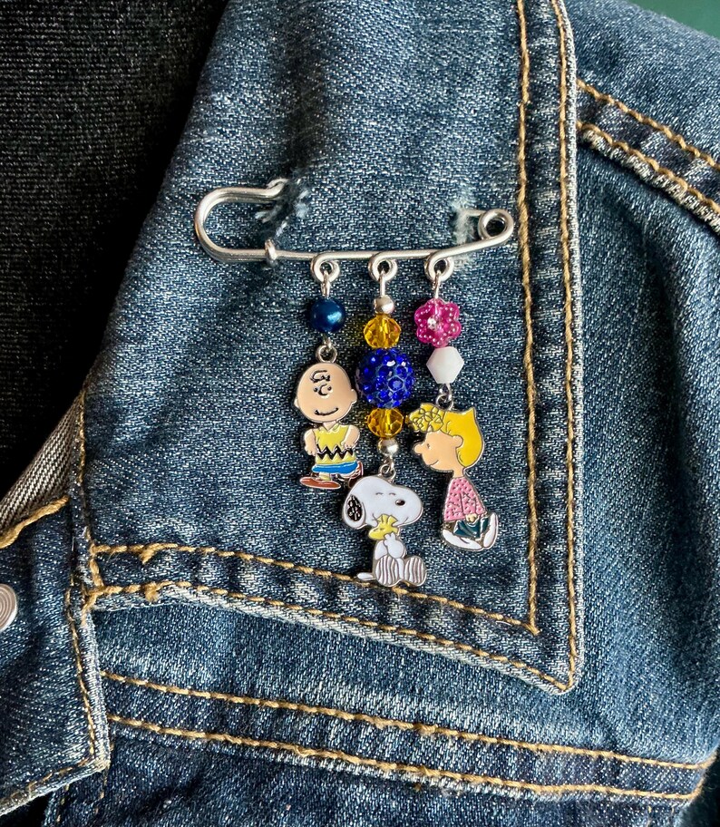 PEANUTS Silver Safety Pin With Snoopy and Woodstock, Charlie Brown and ...