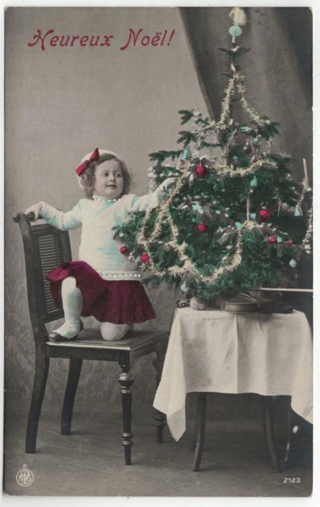 1911 Edwardian Girl Decorating CHRISTMAS TREE With Silver Garland ...
