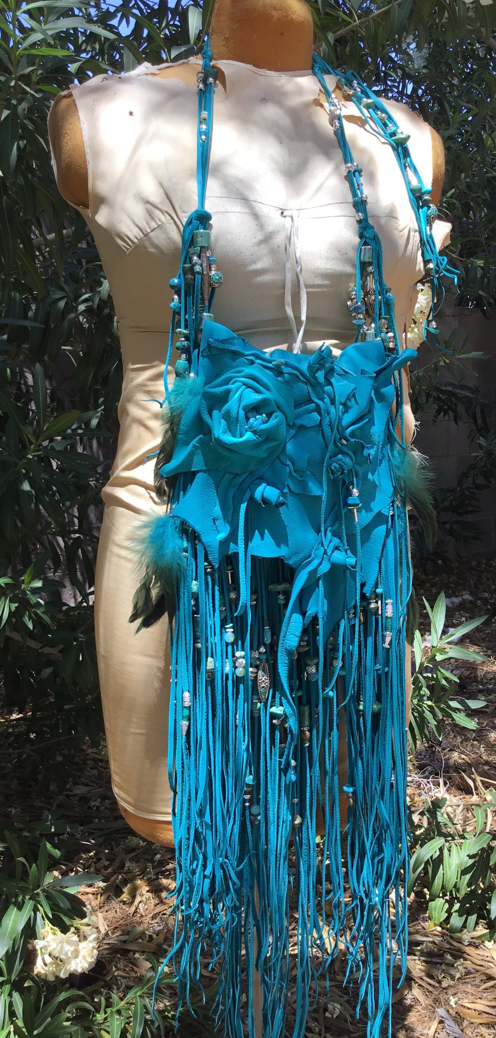 Showdiva Designs Breathtaking Turquoise Purse Dripping With Fringe to ...