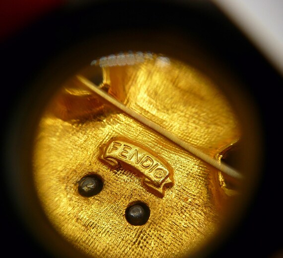 Fendi JANUS coin logo brooch pin, iconic Roman design… - Gem