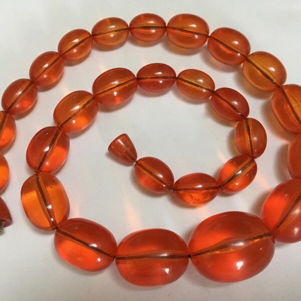 Orange Bakelite - Etsy