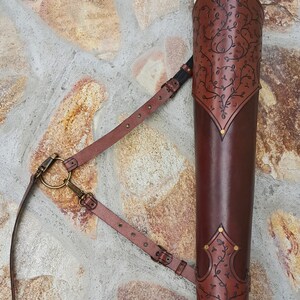 Leather Back Quiver With Adjustable Three Straps Harness and A Brass ...