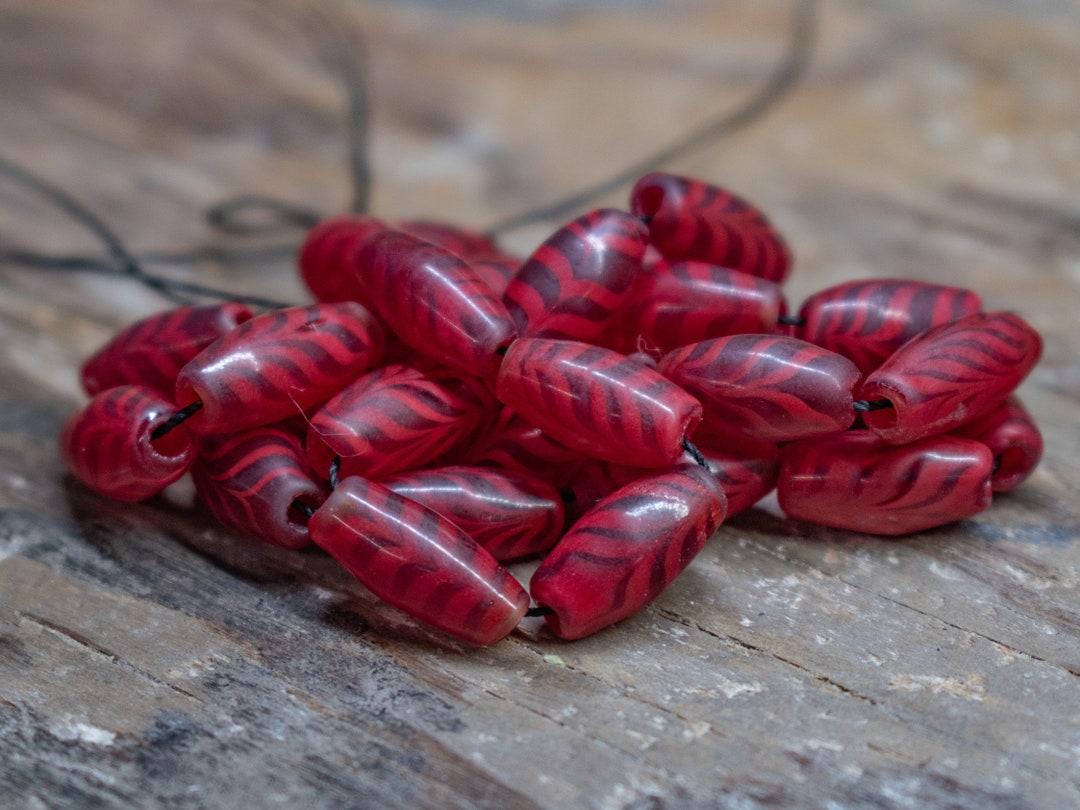 Red on Red Feather Beads - Etsy