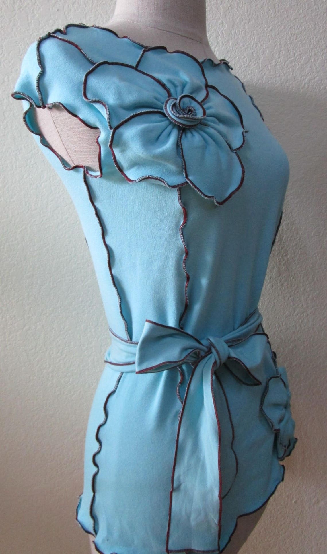 Aqua Color Sleeveless Top With 2 Roses Decoration and a Belt for ...