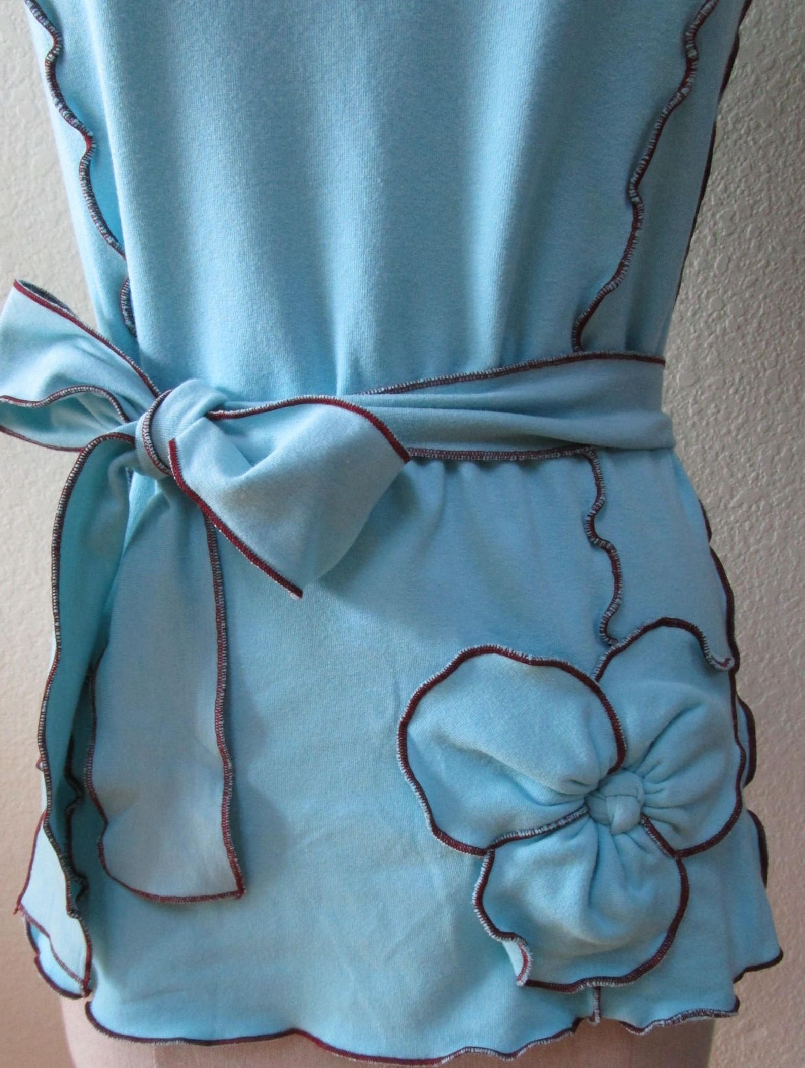 Aqua Color Sleeveless Top With 2 Roses Decoration and a Belt for ...