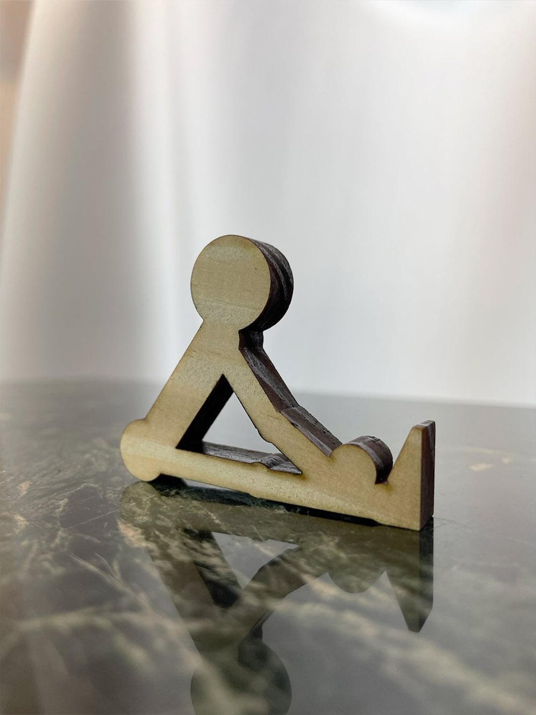 Toe Reach – A Laser-cut Yoga Figure Stretching Beyond Limits While ...