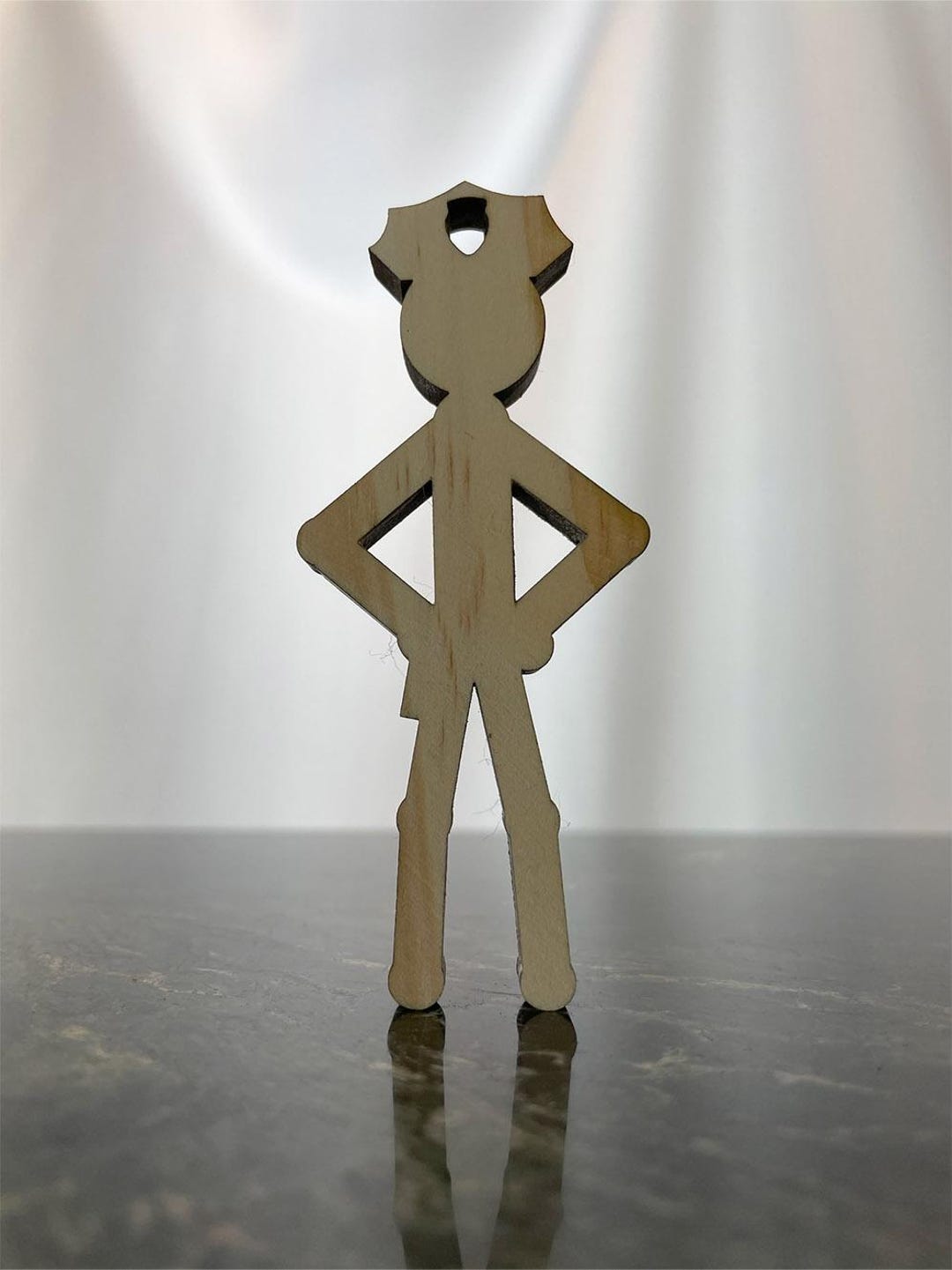 Steadfast Guardian – A Poised Police Officer in a Laser-cut Sculpture ...
