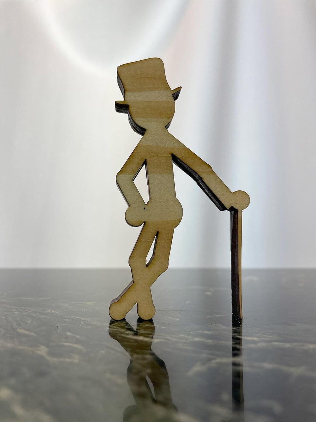 Dapper Swagger – A Stylish Laser-cut Figure in a Top Hat and Cane ...