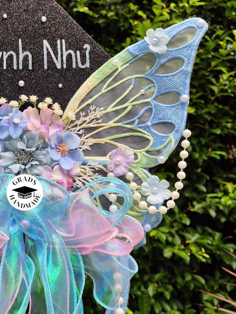 Custom Butterfly Wings Graduation Cap Topper With Pastel Flowers ...