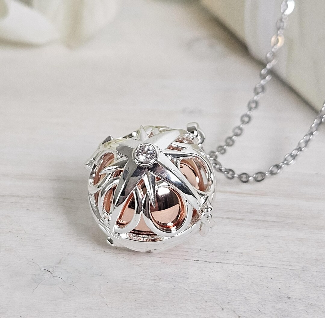Elegant Memorial Starburst Urn Ball Necklace – Keepsake for Ashes ...