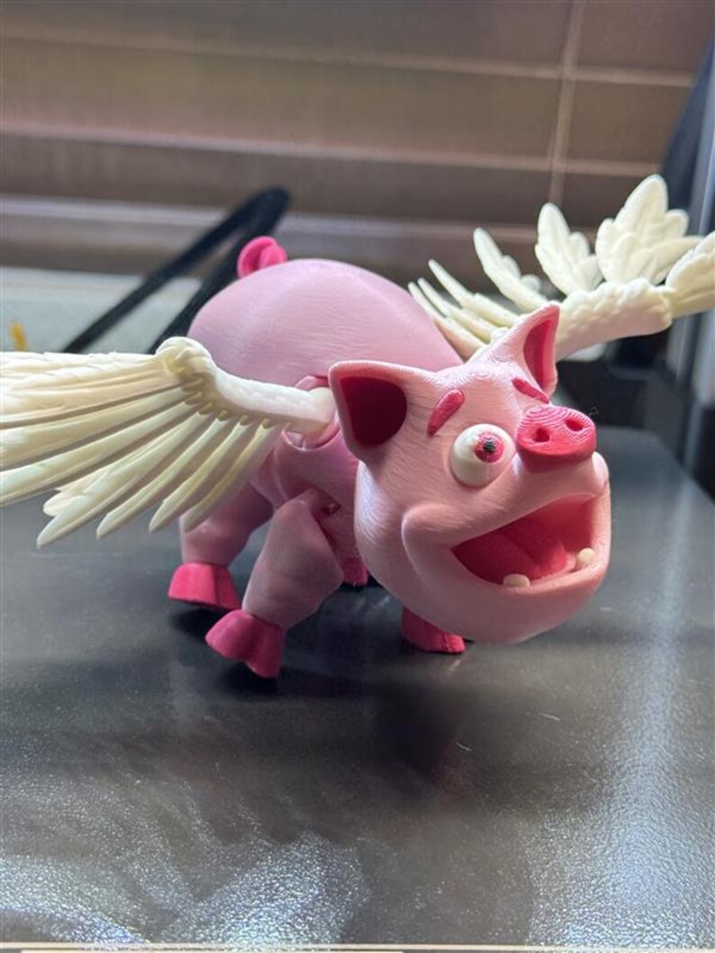 3D Printed Pink Flying Pig - This Adorable Pink Flying Pig Proves That ...